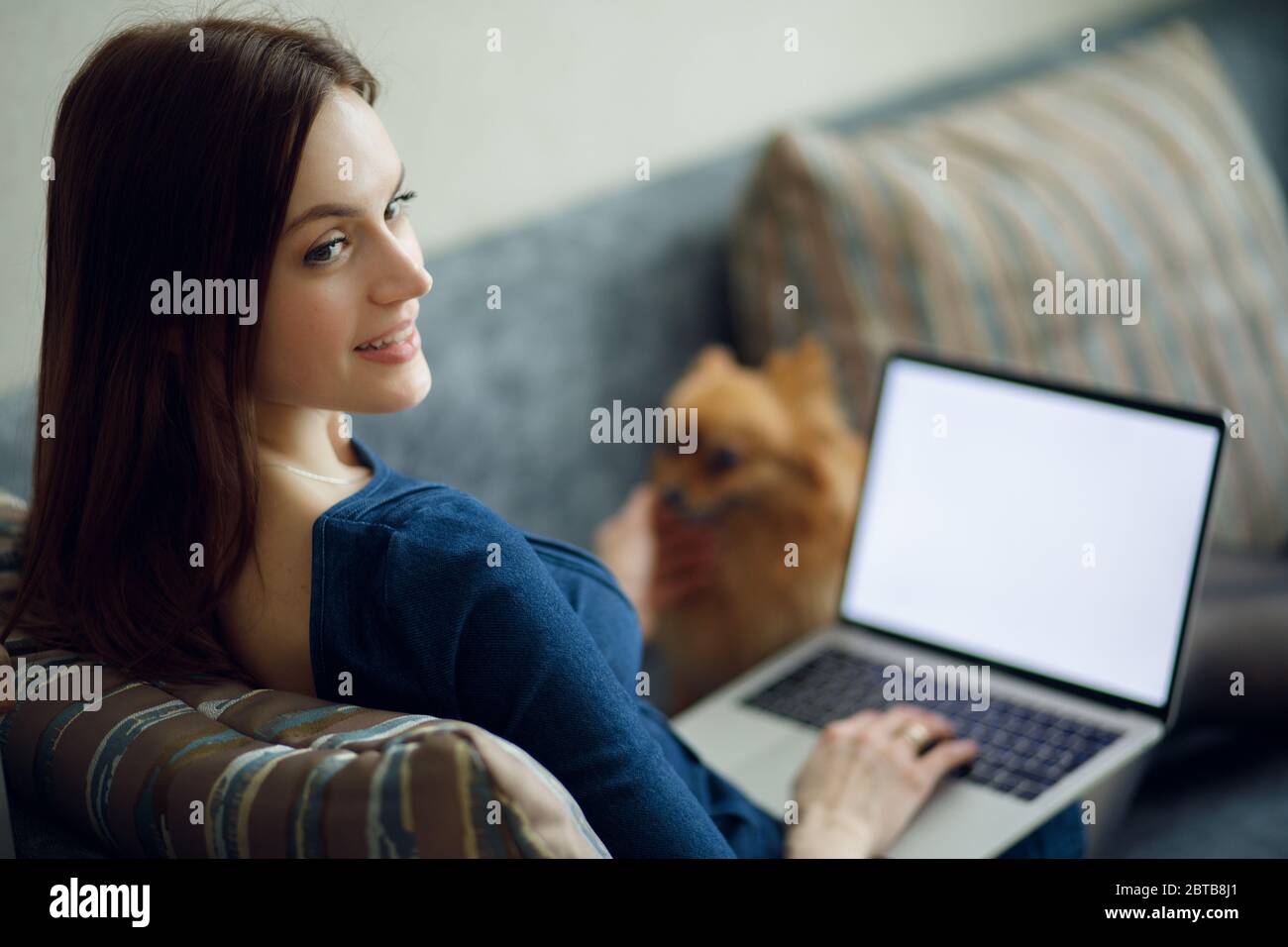 The Girl working at home at computer Stock Photo - Alamy