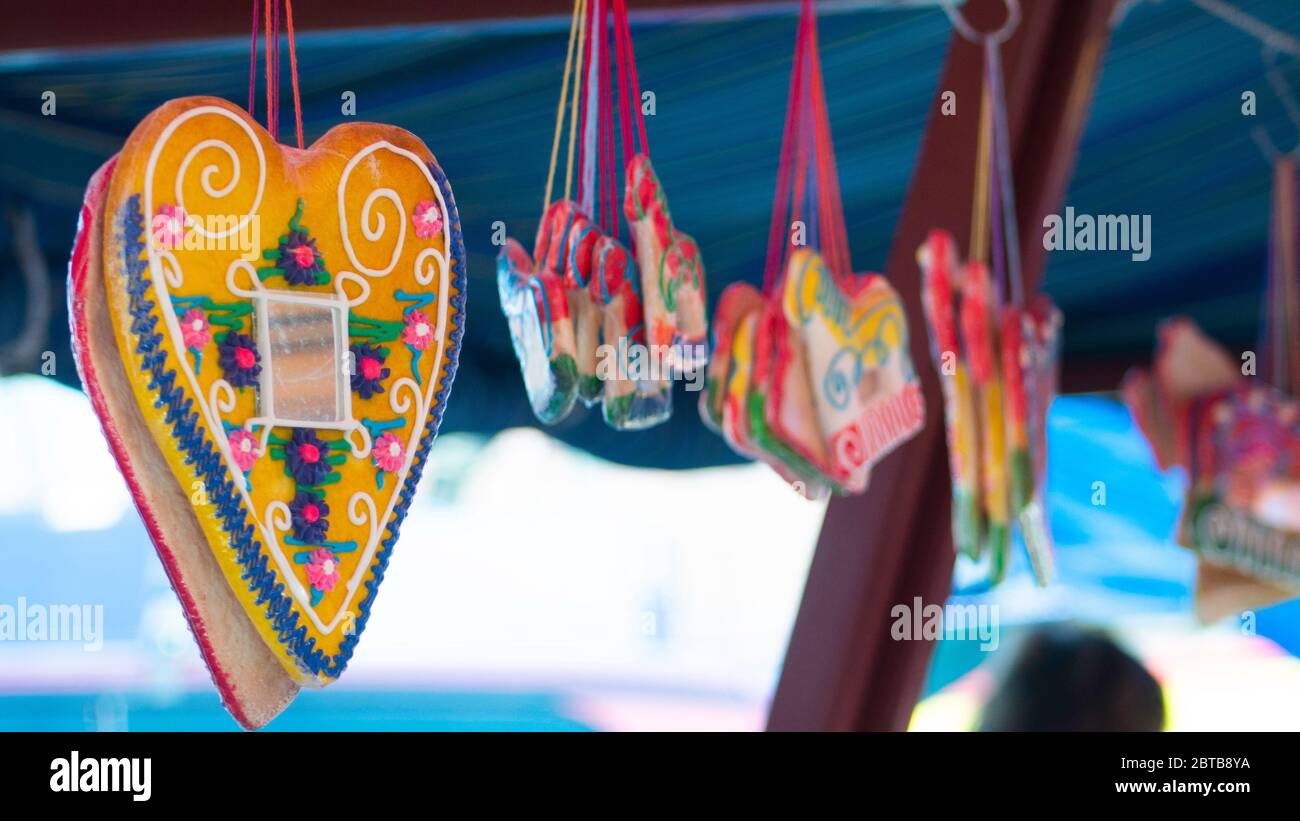 Licitars hearts and gingerbread in the shape of a horse hanging below ...