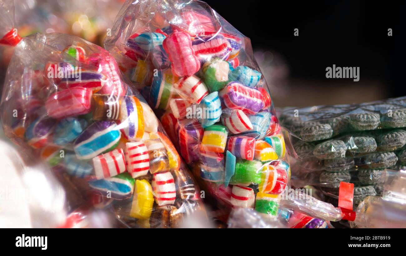 Colorful candies in plastic packaging Stock Photo - Alamy