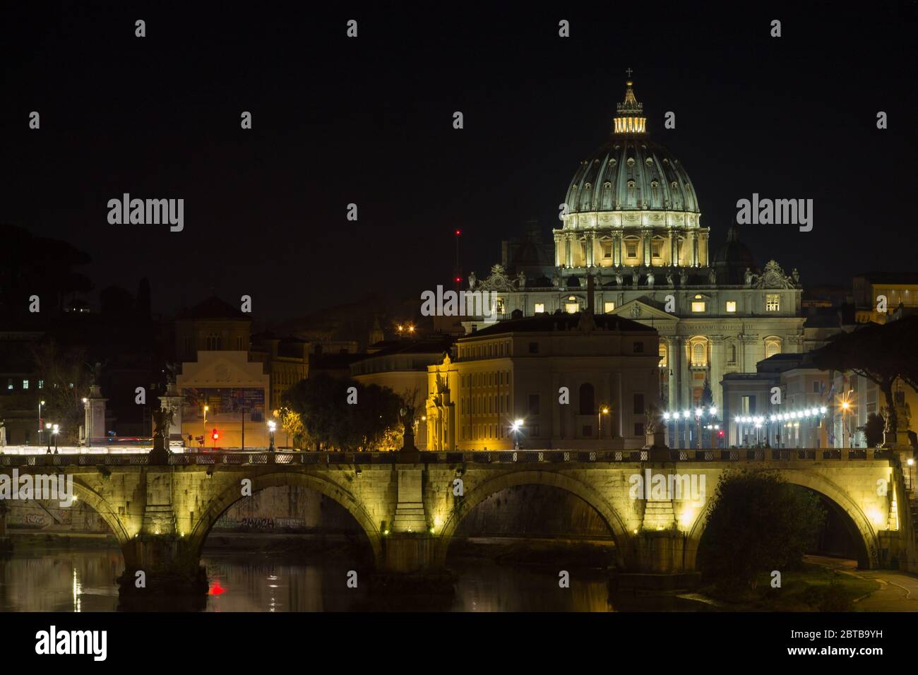 Night scene of Rome, Tevere river with Saint Peter basilica in ...