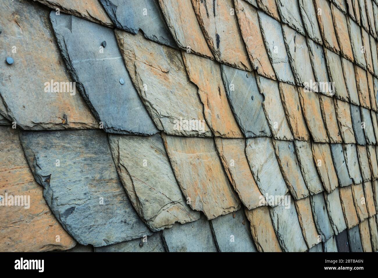 Detail of a historic slate tile wall Stock Photo - Alamy