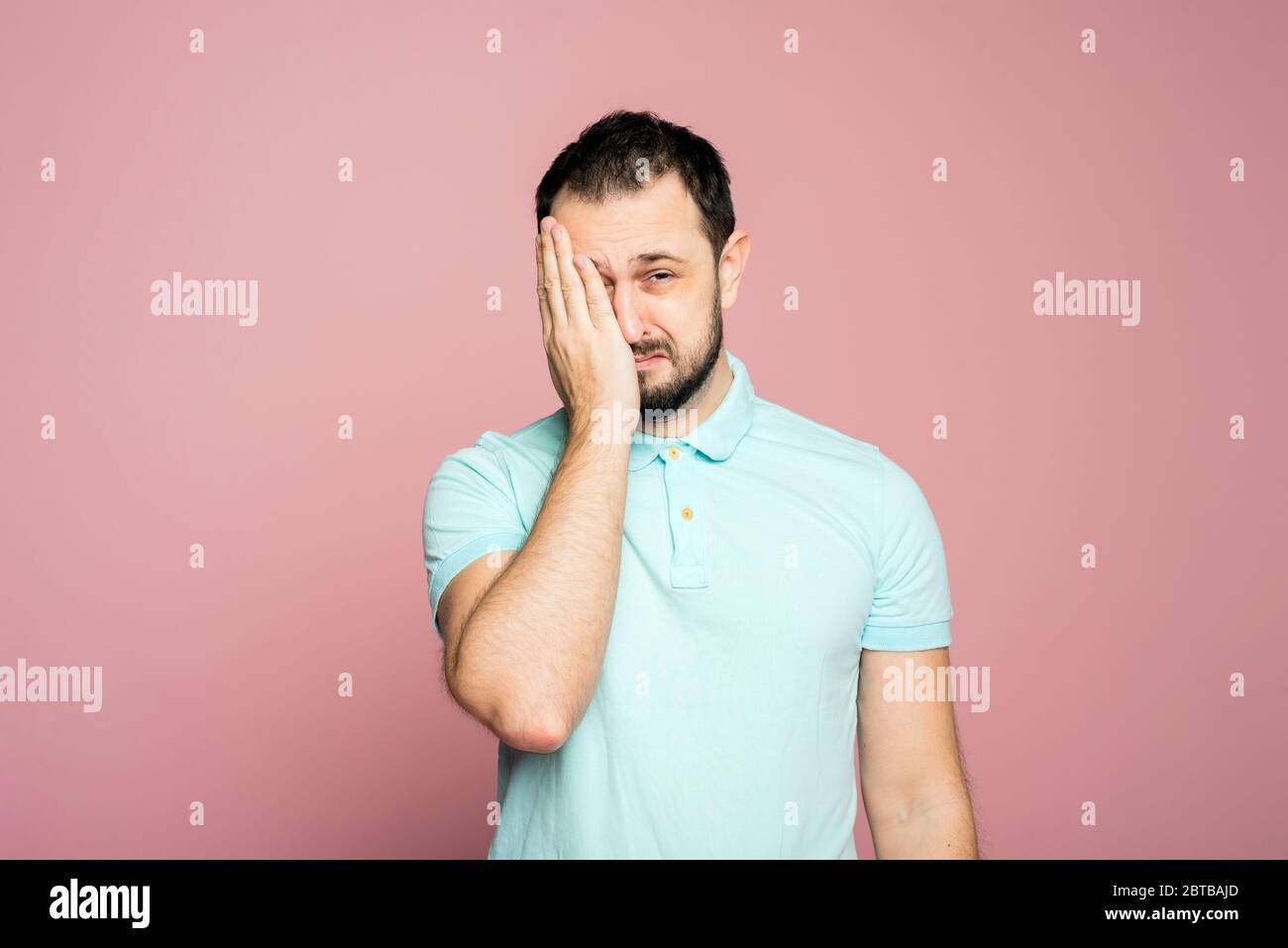 Handsome ashamed young man hi-res stock photography and images - Alamy