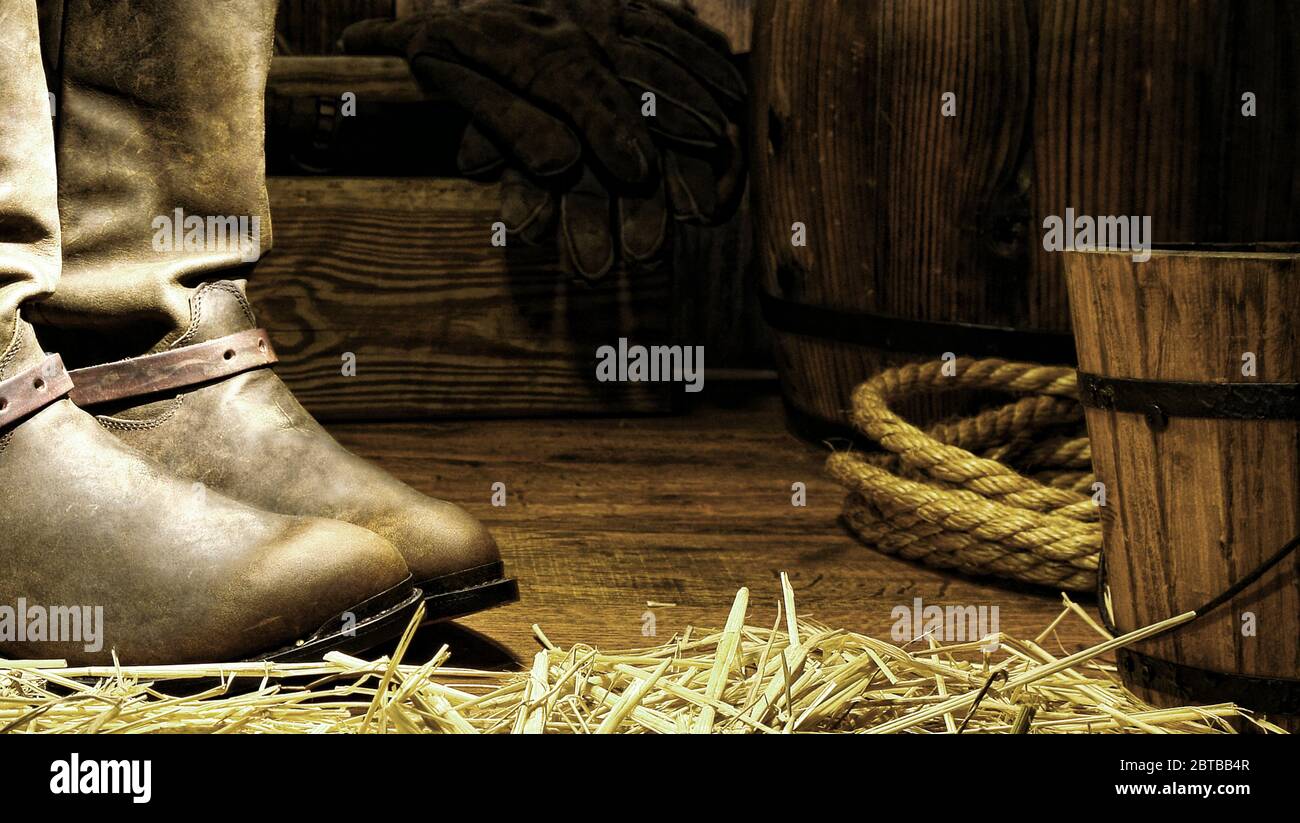Brown leather cowboy boots still life image Stock Photo - Alamy