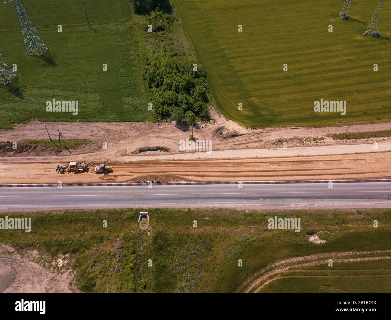Aerial construction site with machinery, bulldozer, excavation. Top ...