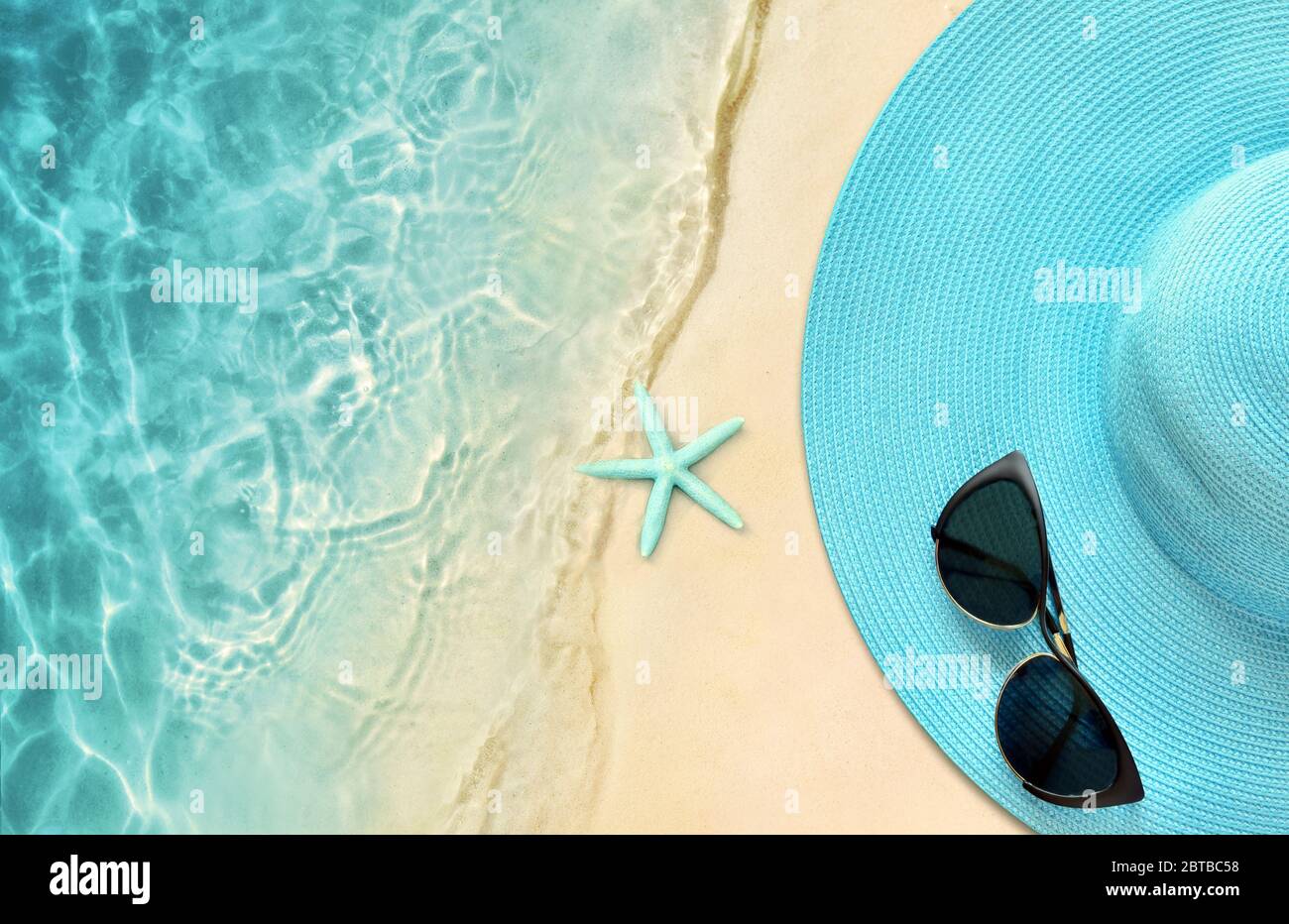 Summer hat with sunglasses. Top view, summer concept over a tropical ...