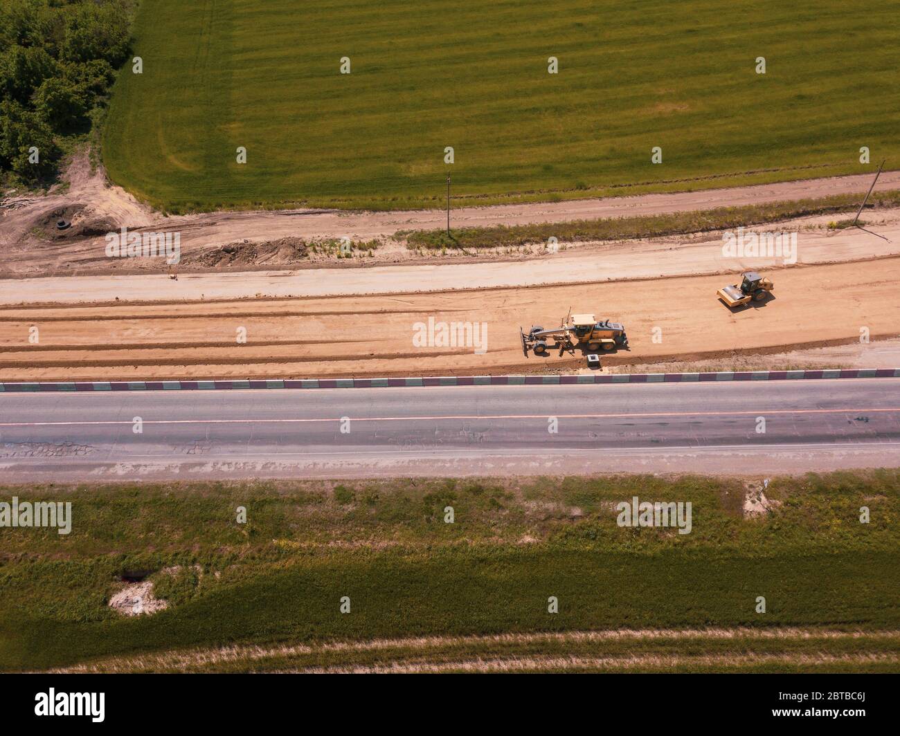 Aerial construction site with machinery, bulldozer, excavation. Top ...
