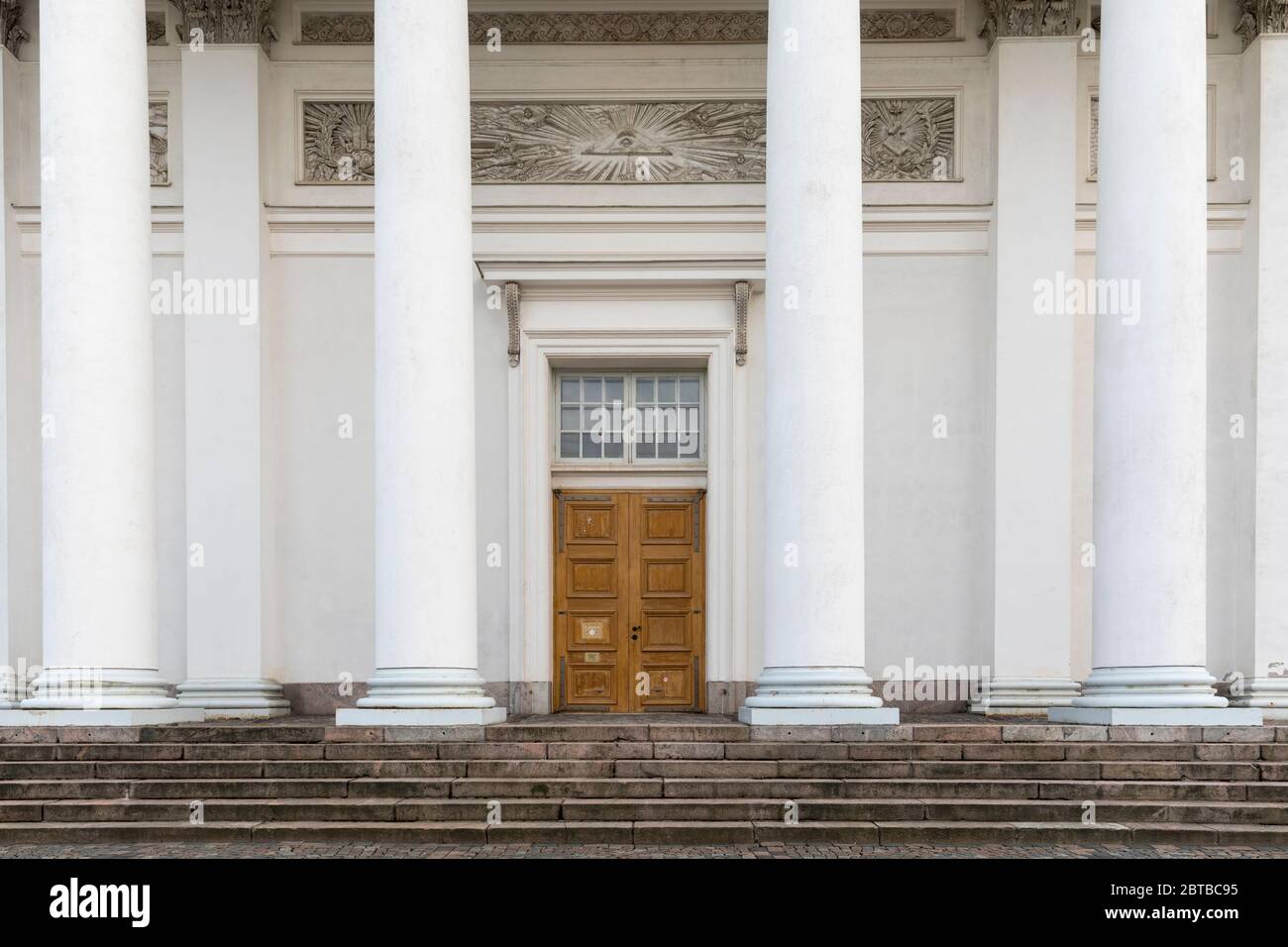 Doorway and architectural colonnade in front of cathedral in Helsinki ...