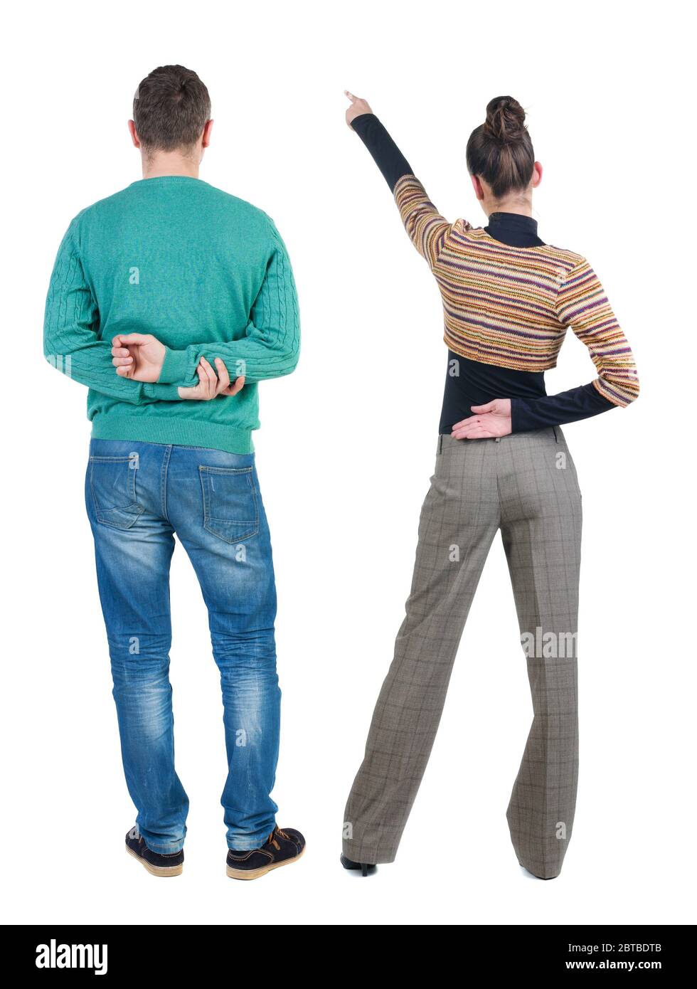 Back view of couple in sweater with mobile phone. beautiful friendly ...