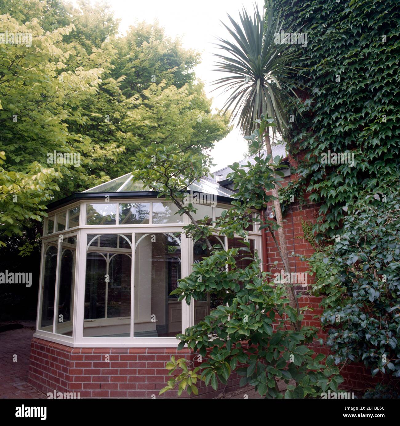 Small conservatory extension on a townhouse Stock Photo - Alamy