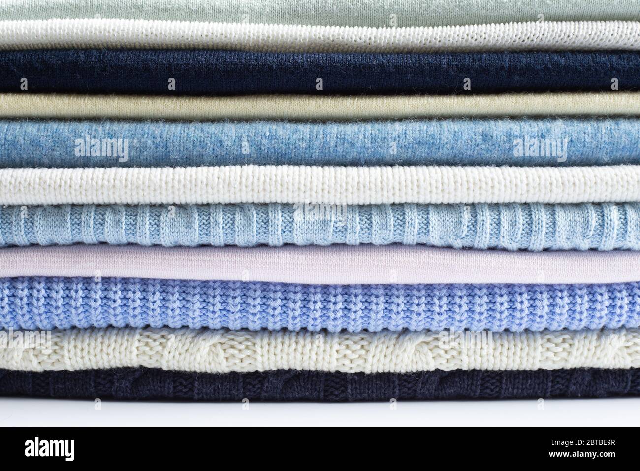 Folded jumpers hi-res stock photography and images - Alamy