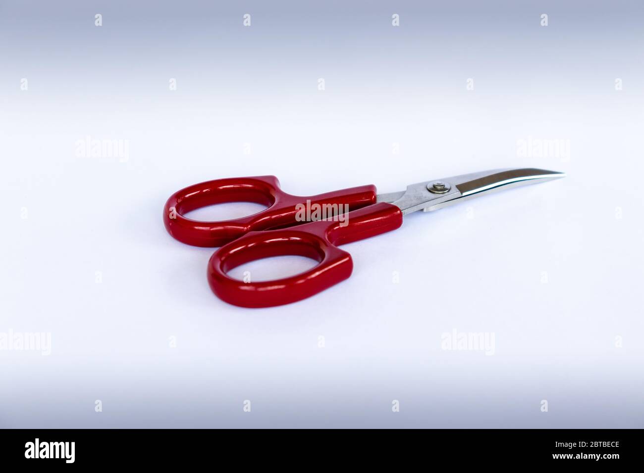 Curved scissors hi-res stock photography and images - Alamy