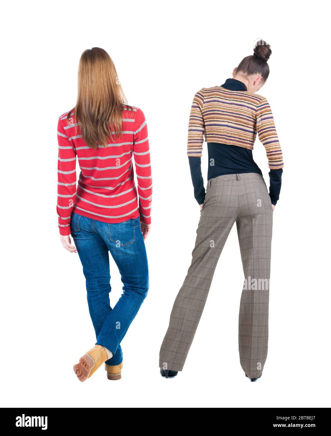 Back view of two woman in sweater. Rear view people collection ...