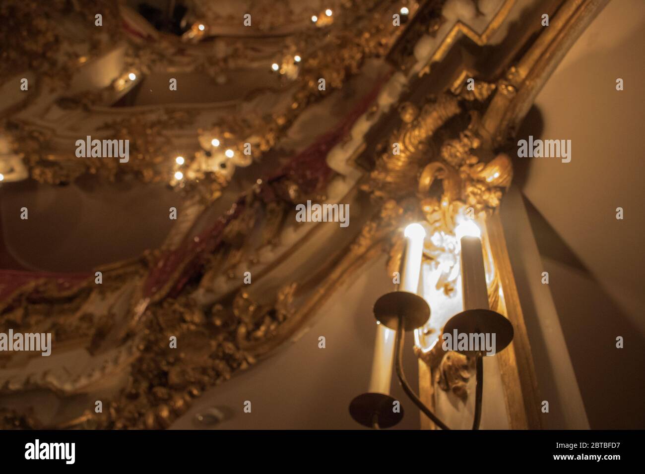 Candle lights in an opera theater Stock Photo - Alamy