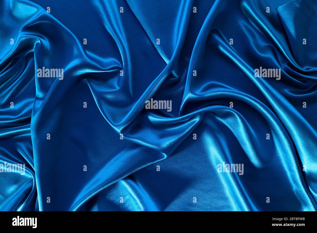 Closeup of lines in blue silk fabric Stock Photo - Alamy