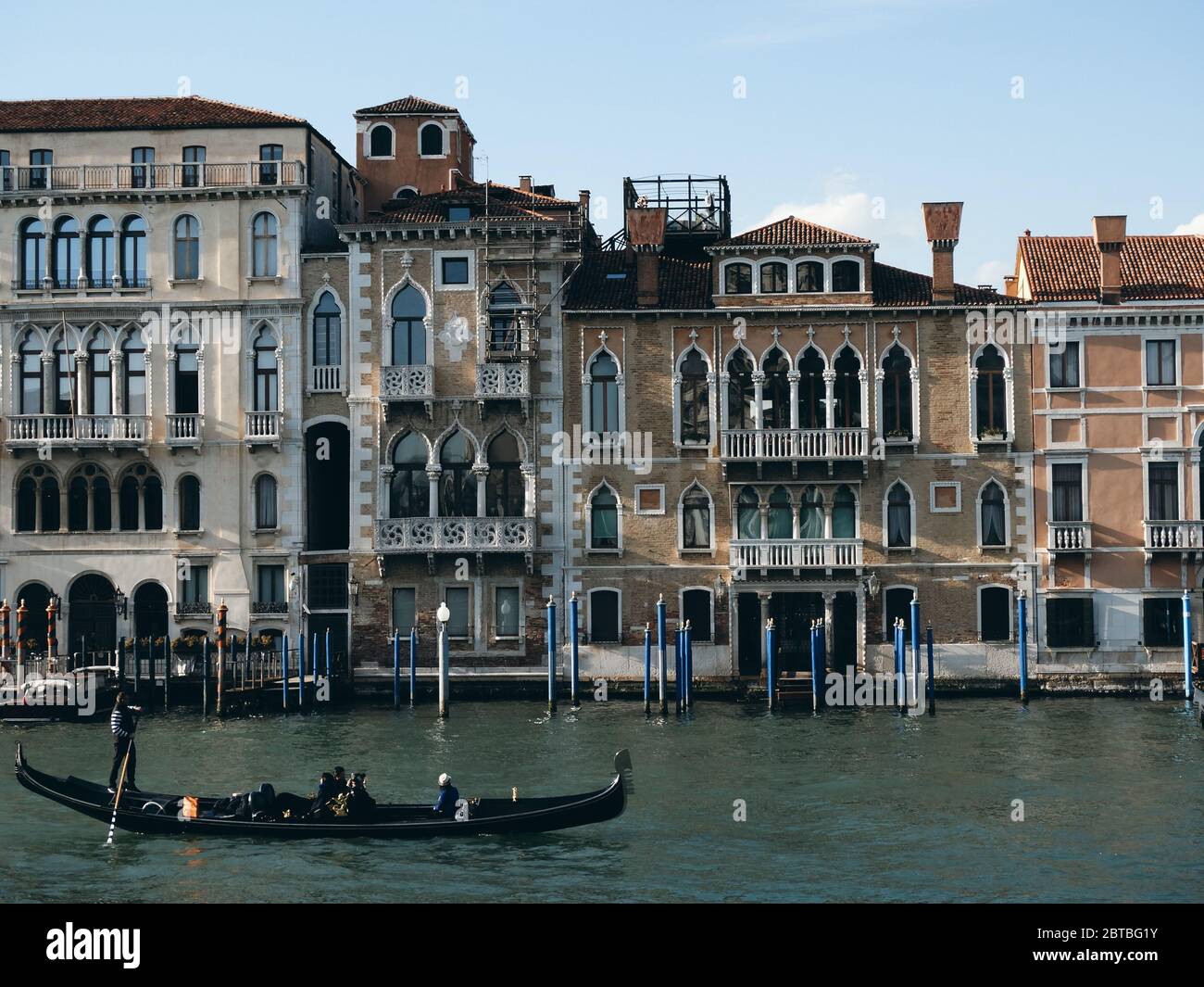 A gondola and some classic buildings in tourist Venice Grand Canal ...
