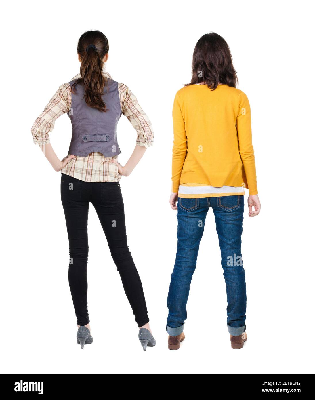 Back view of two woman in sweater. Rear view people collection ...