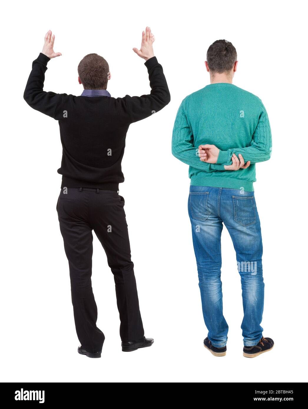 Back view of two man in sweater pointing. Rear view people collection ...