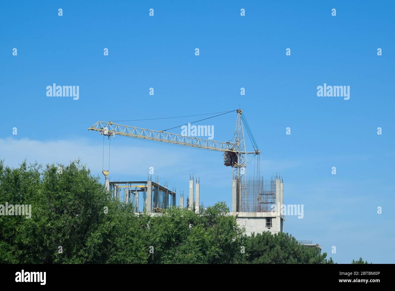 construction of multi-storey residential buildings. Tower cranes at a ...