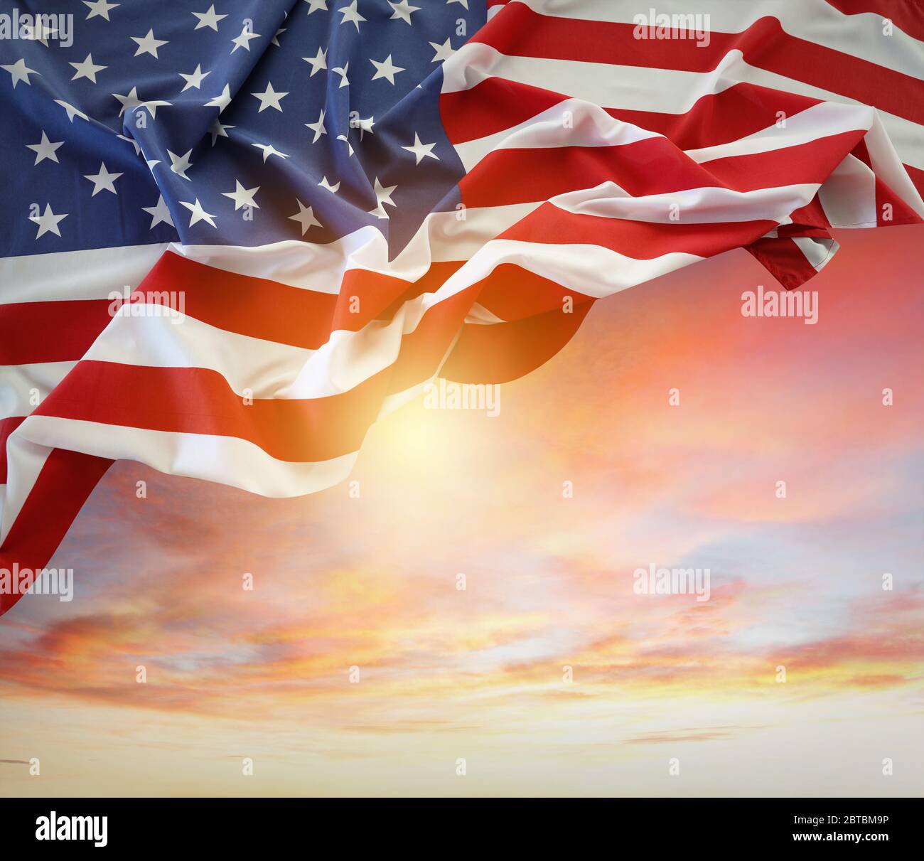 American flag in bright sky Stock Photo - Alamy