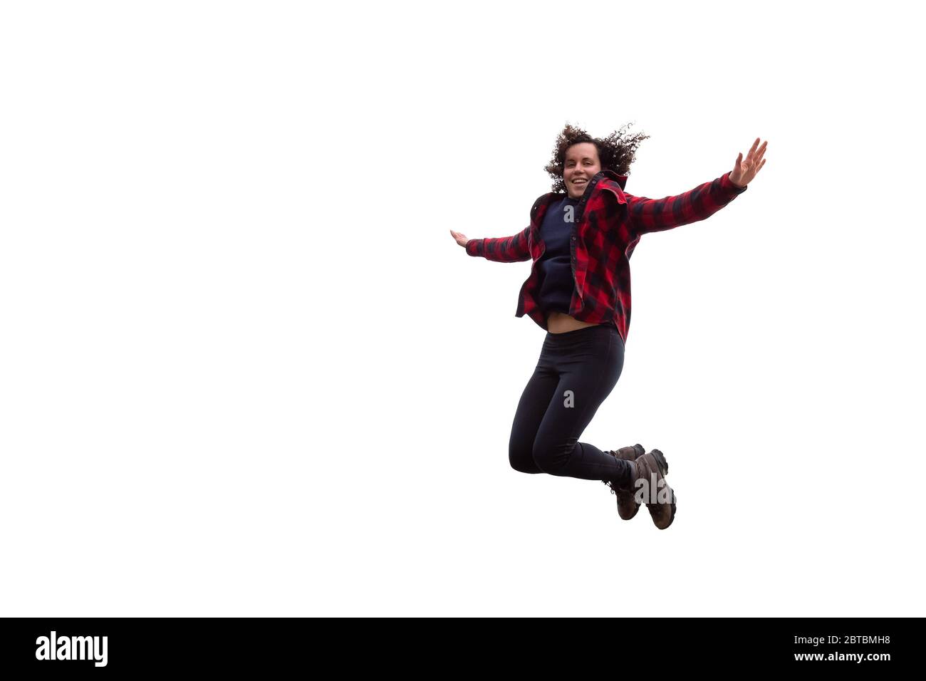 Happy and Excited Girl Jumping with Joy Stock Photo - Alamy