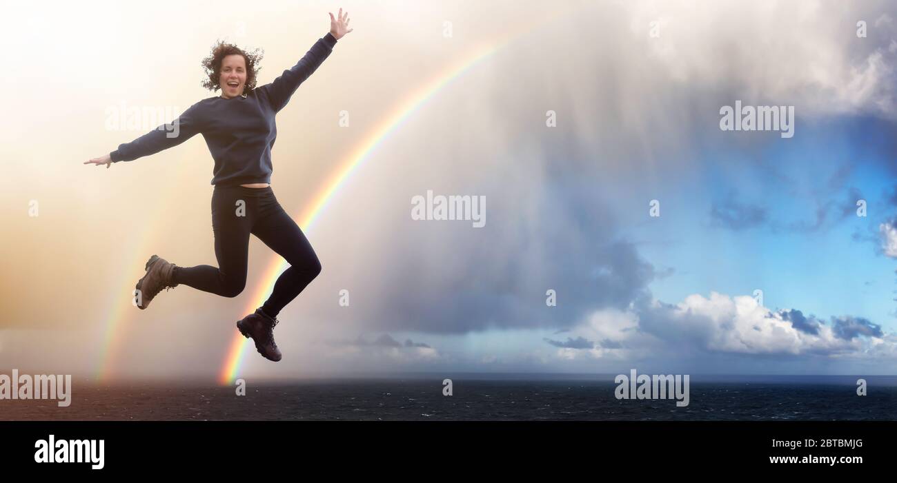 Happy and Excited Girl Jumping with Joy Stock Photo - Alamy