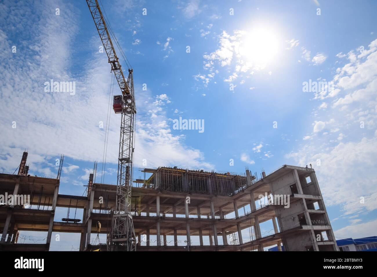 construction of multi-storey residential buildings. Tower cranes at a ...