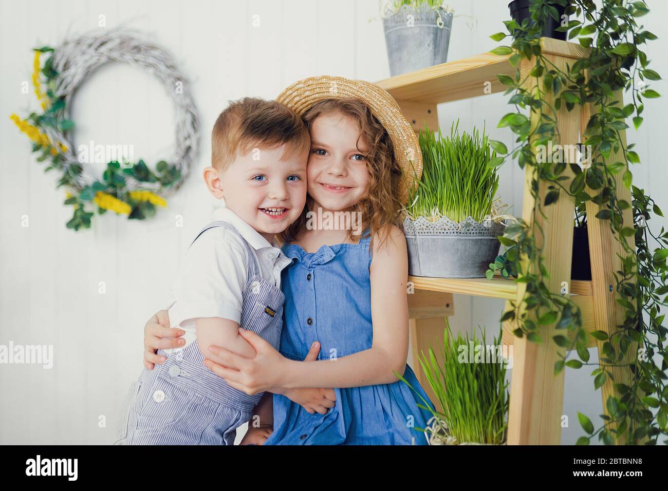 Happy brother and sister embracing each other Stock Photo - Alamy