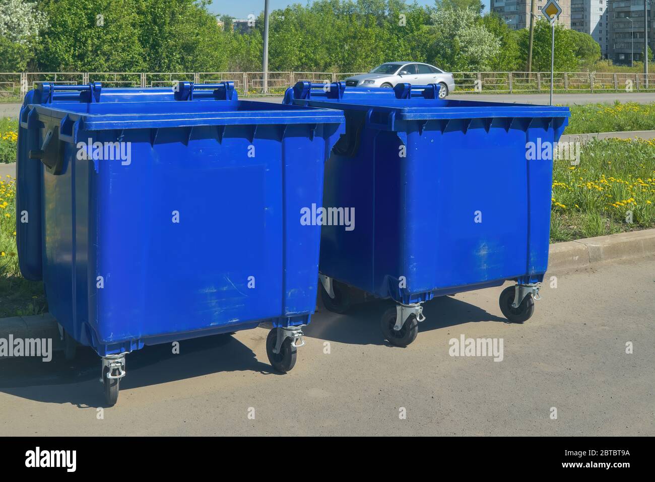 Blue plastic trash recycling containers. Blue containers for collecting ...