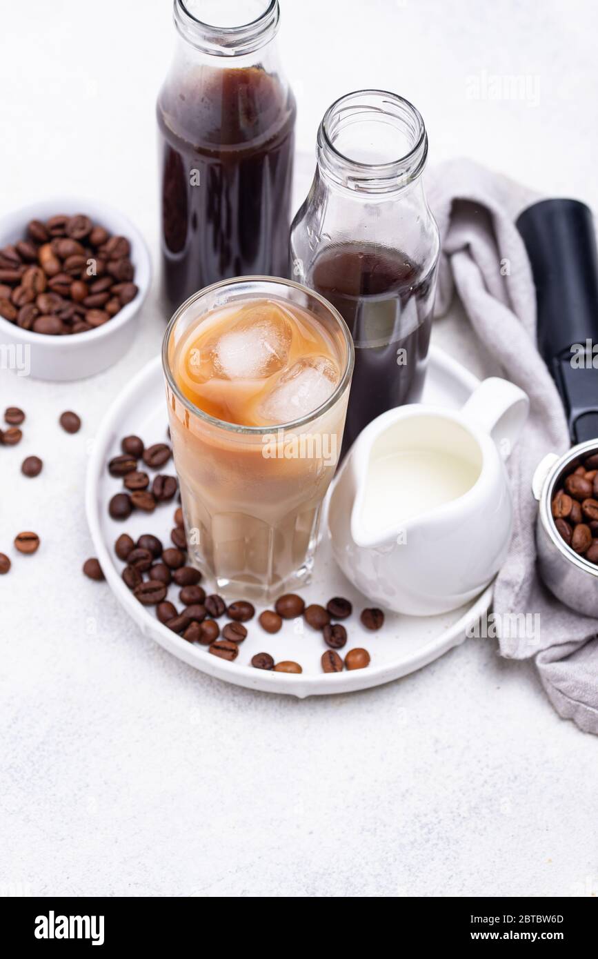 Cold brew coffee with ice and milk Stock Photo - Alamy