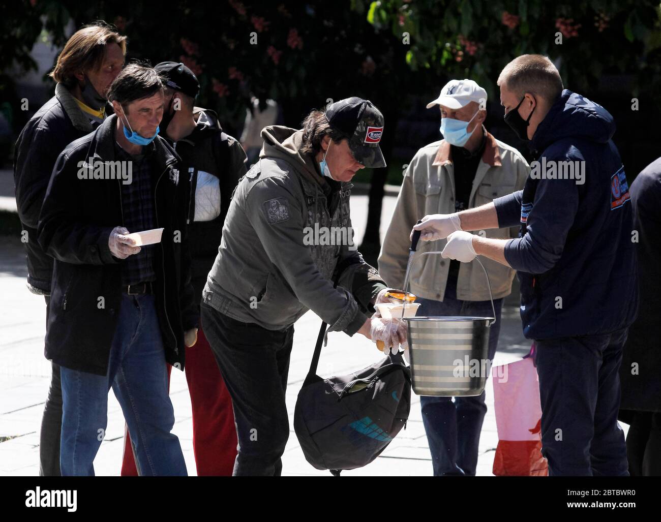 Children queue free food hi-res stock photography and images - Alamy