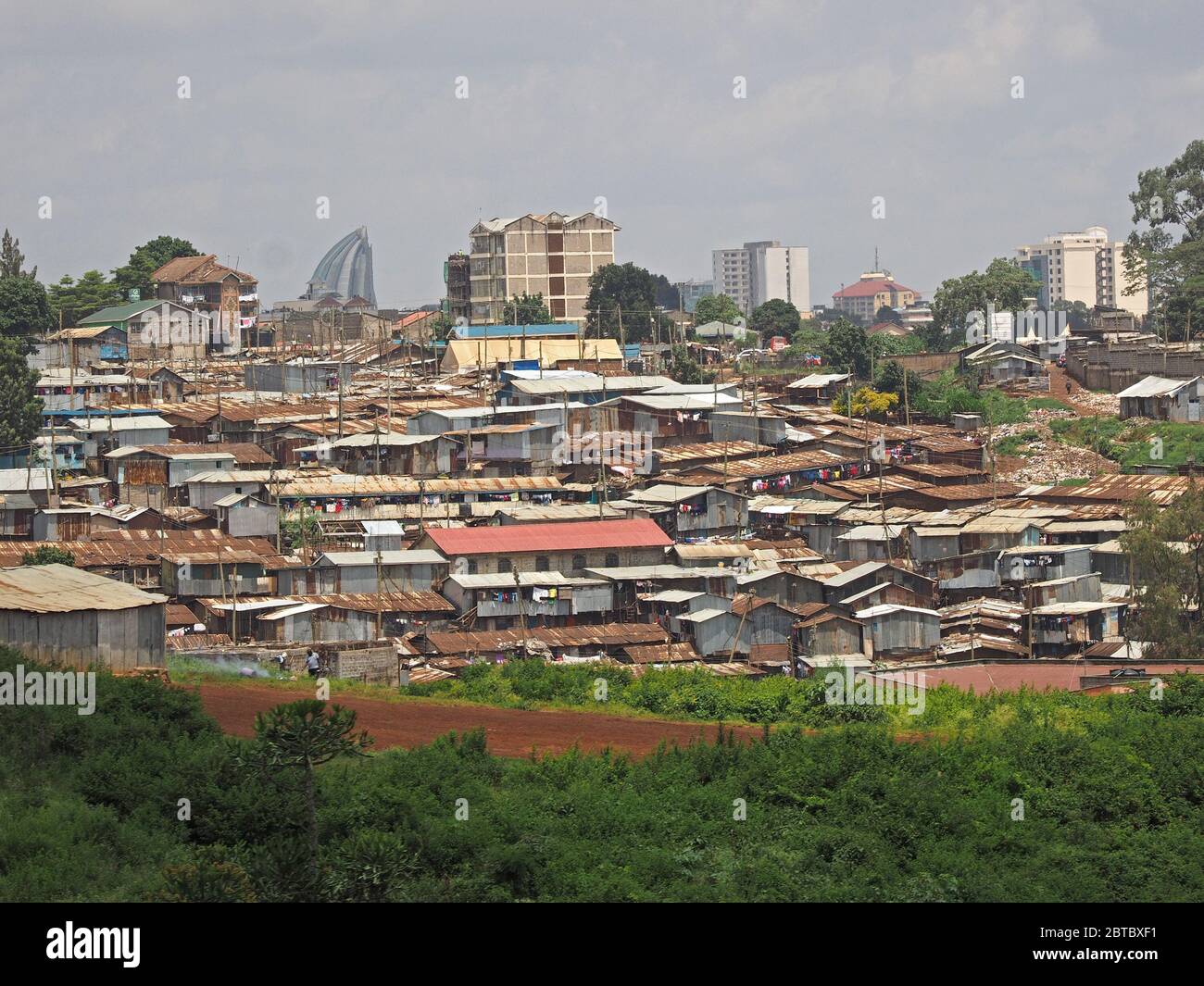 view over the tin roofs of the infamous Kibera slum district towards a ...