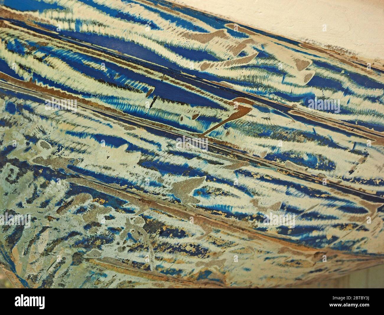 abstract image of machine-sanded blue & white paintwork on hull planks ...