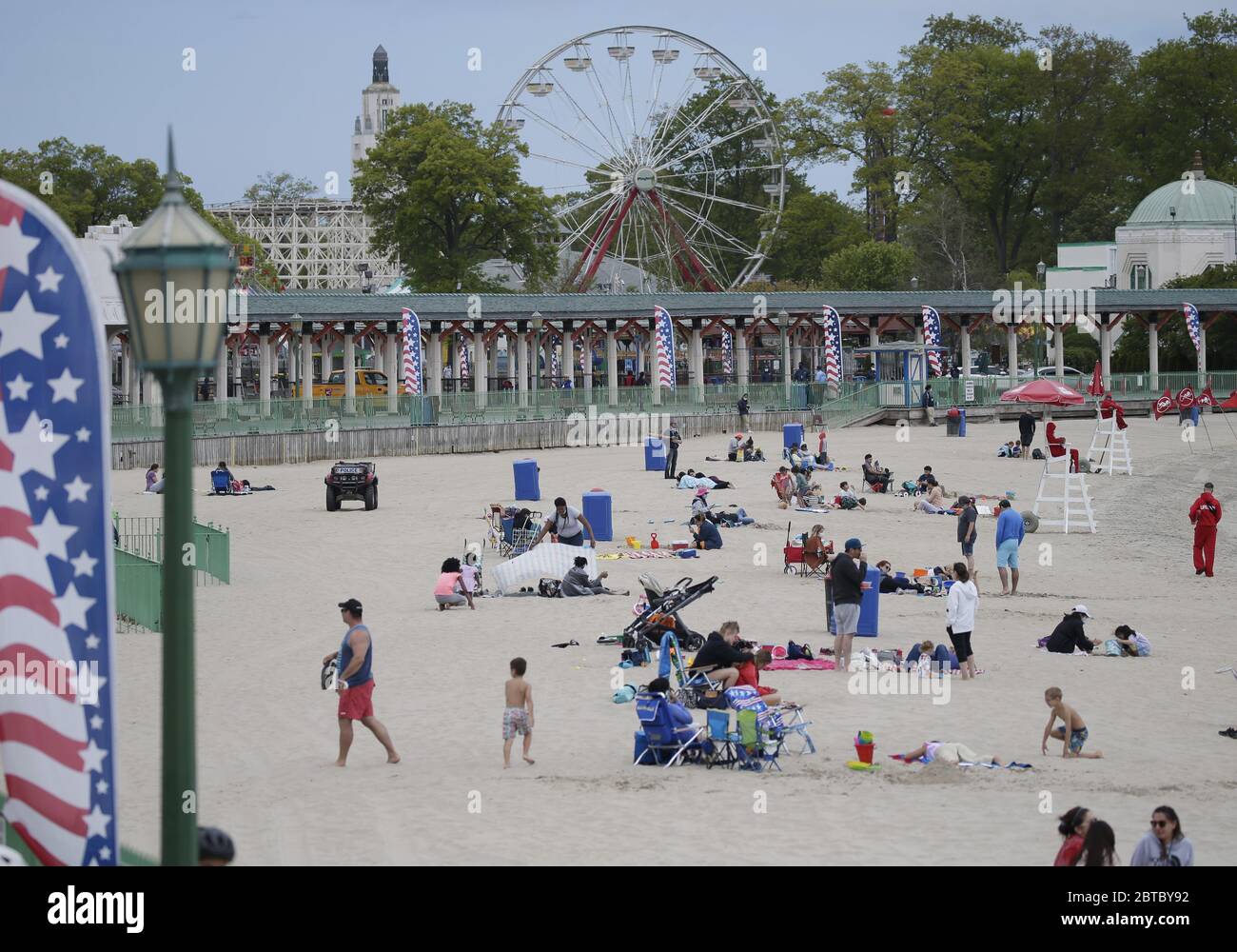 Rye, United States. 24th May, 2020. People gather at the beach for ...