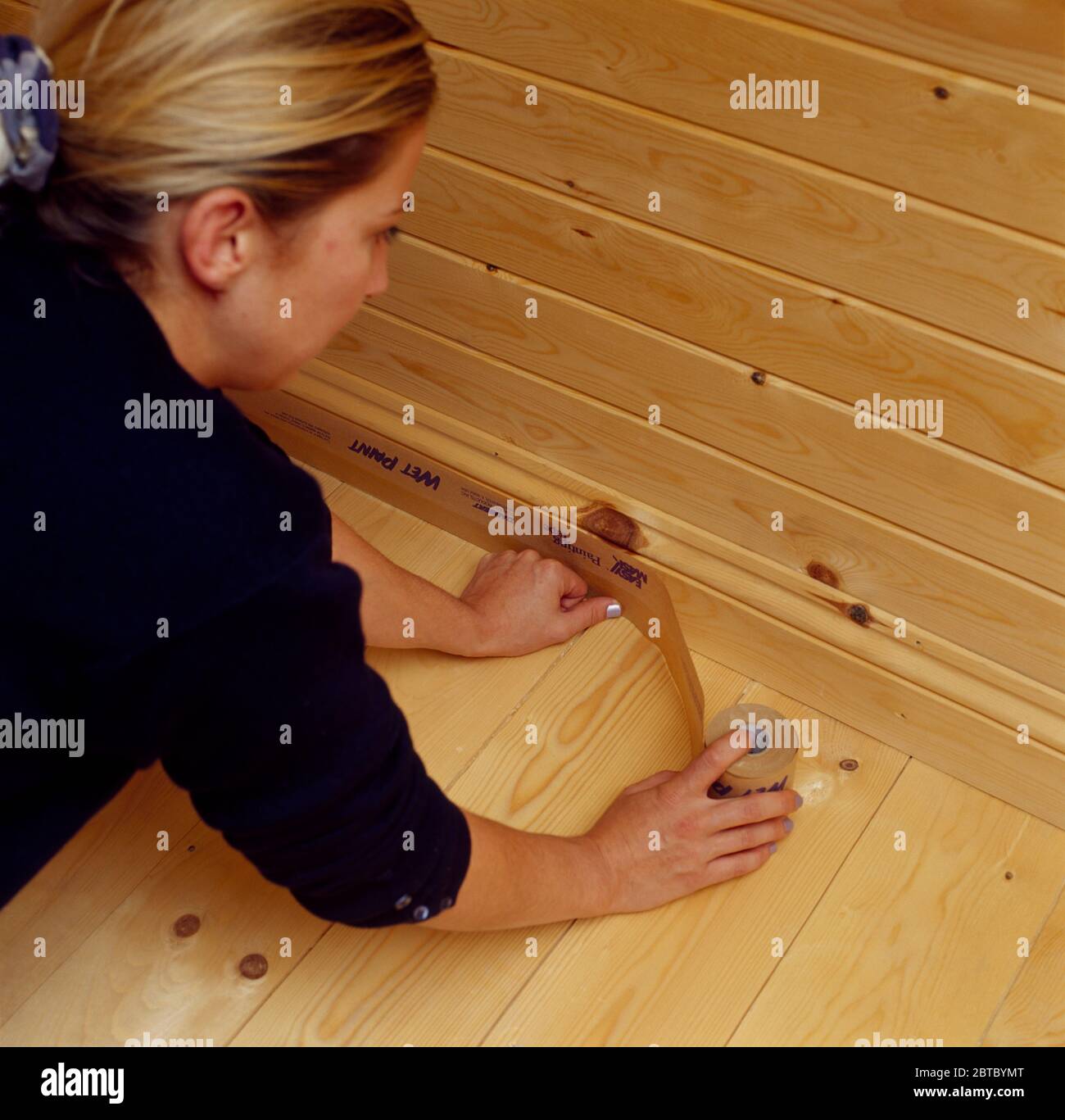 Masking up panelling hi-res stock photography and images - Alamy