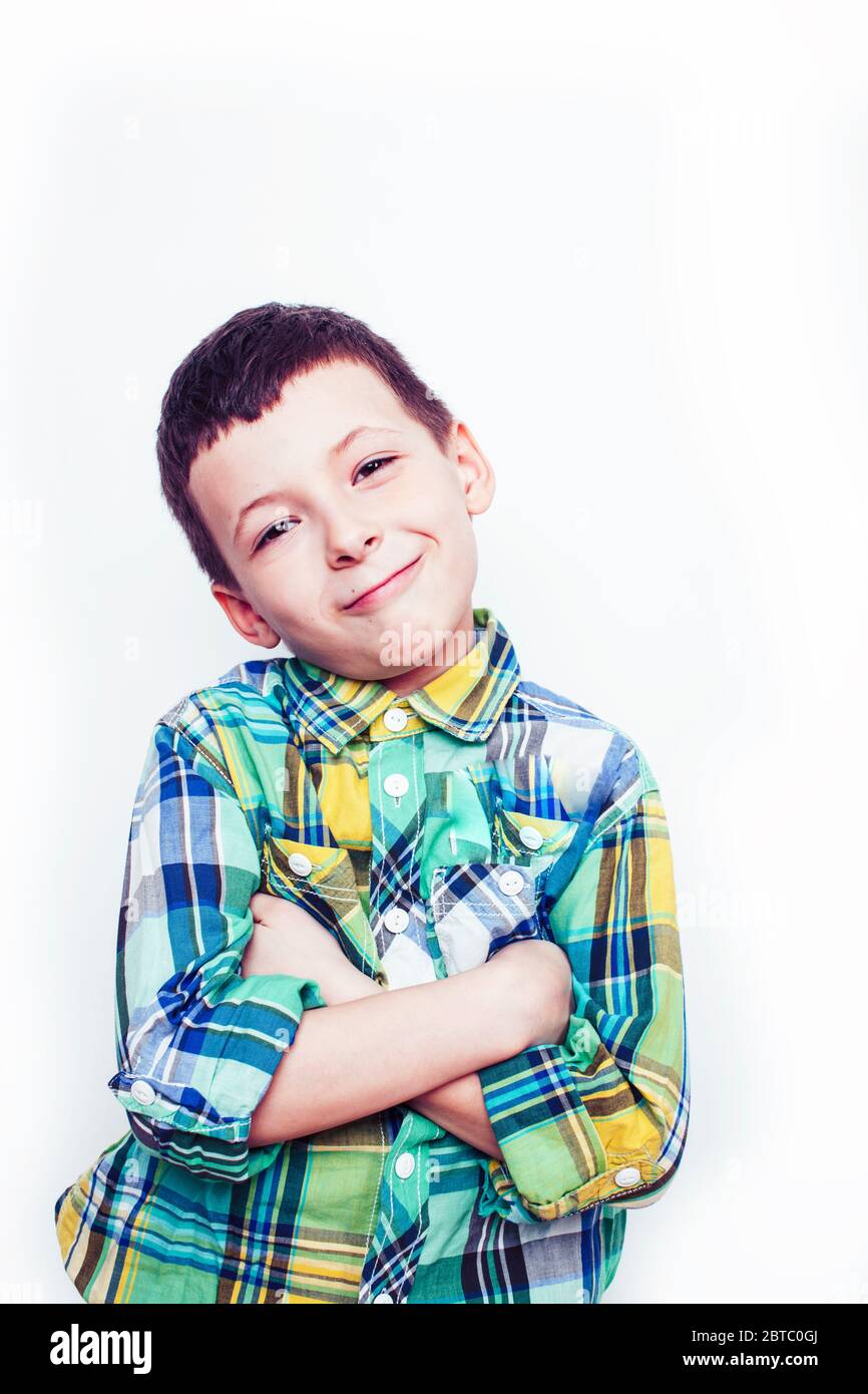 little cute real boy on white background gesture smiling close up ...