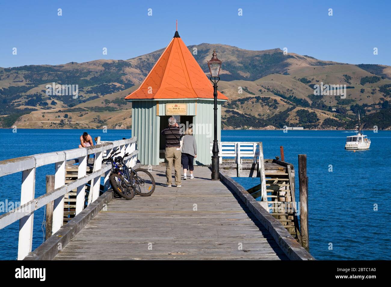 Akaroa wharf christchurch new zealand hi-res stock photography and ...