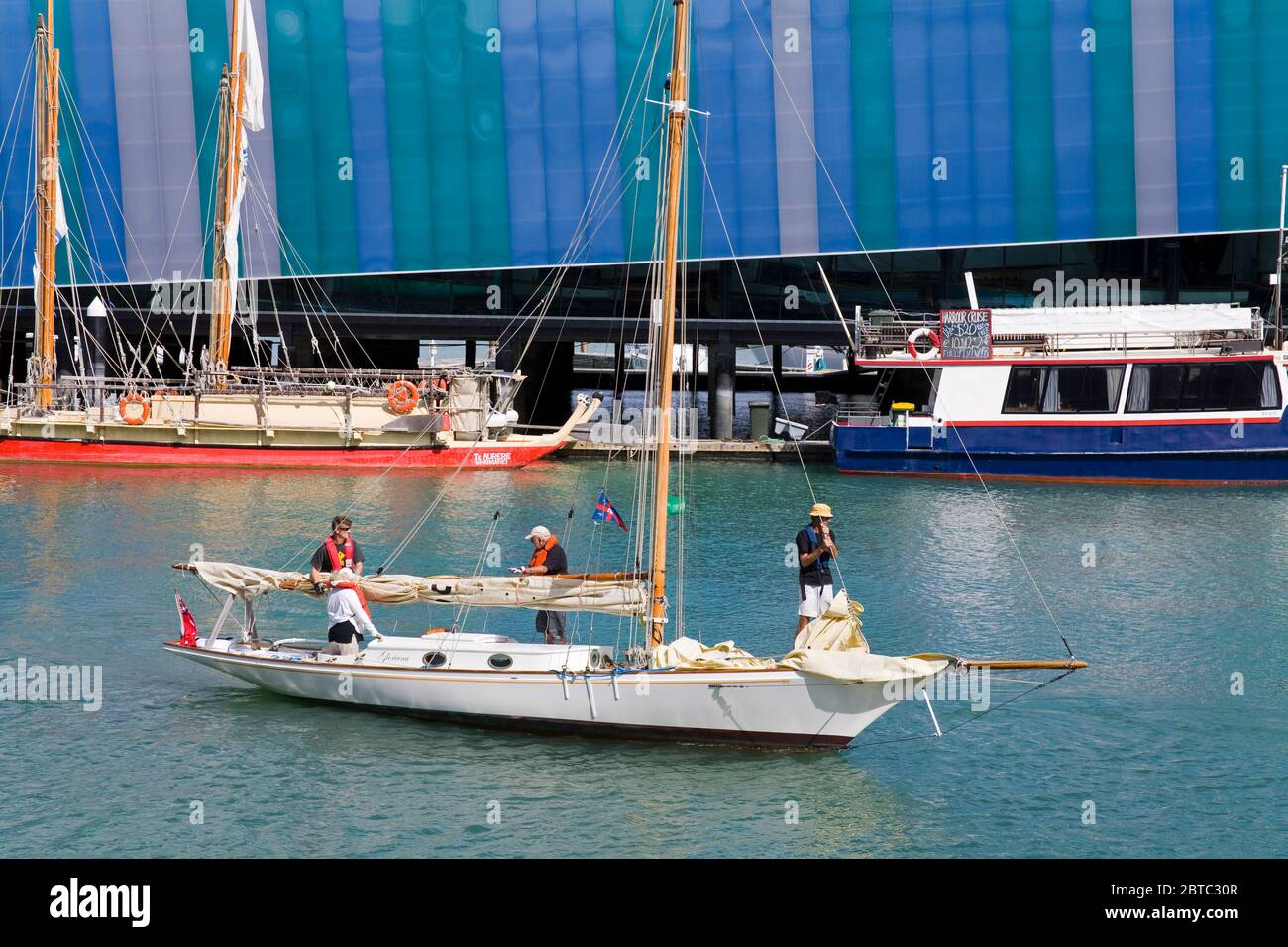 Yacht passing the National Maritime Museum,Auckland,North Island,New ...