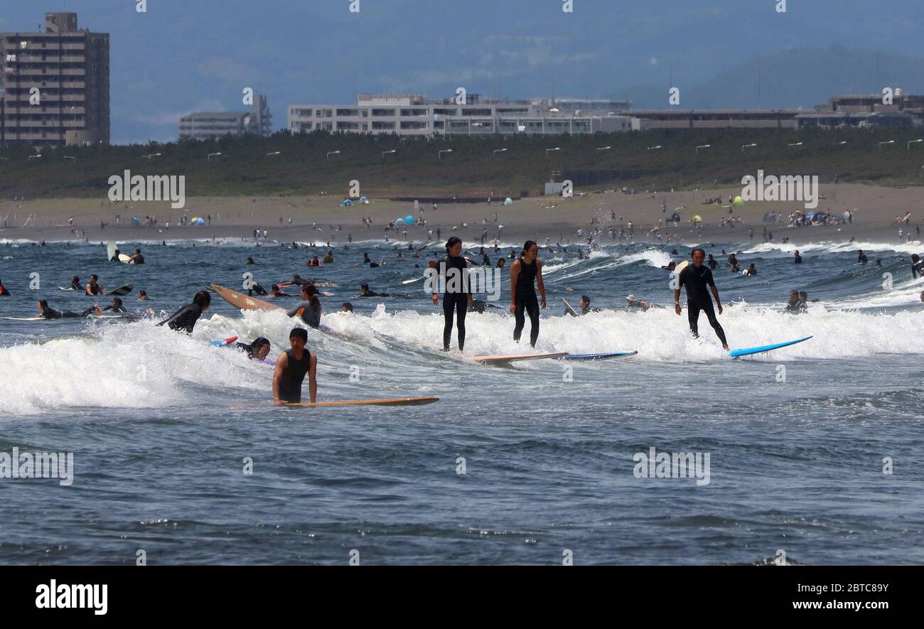 Tokyo, Japan. 24th May, 2020. People enjoy surfing at the Katase ...