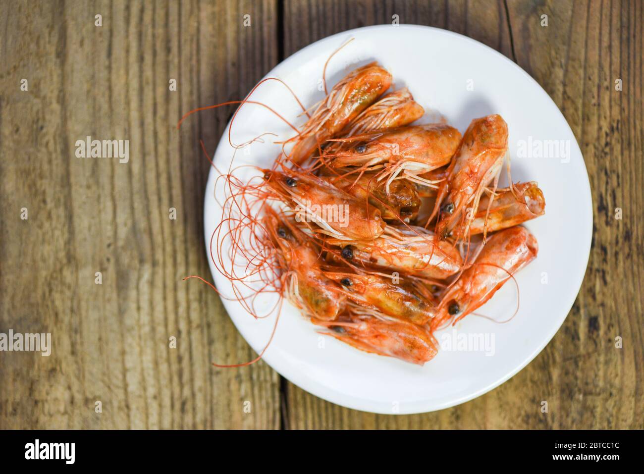 Deep fried crispy shrimp head delicious seasoning spices on plate and ...