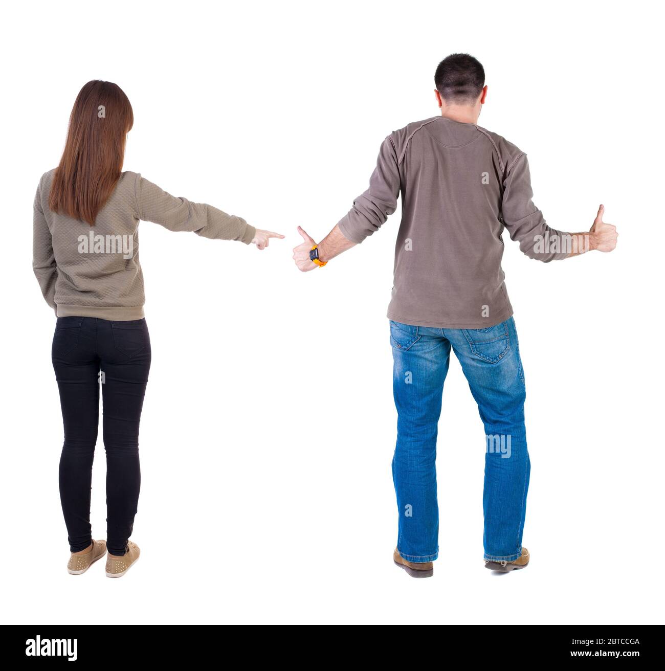 Back view of couple in sweater with mobile phone. beautiful friendly ...