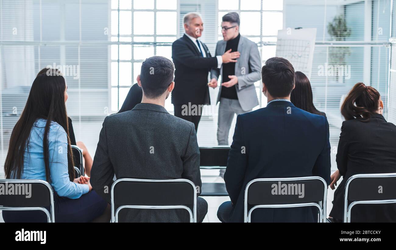 Manager is introducing a new employee of the company Stock Photo - Alamy
