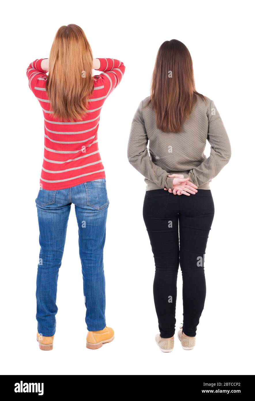 Back view of two woman in sweater. Rear view people collection ...