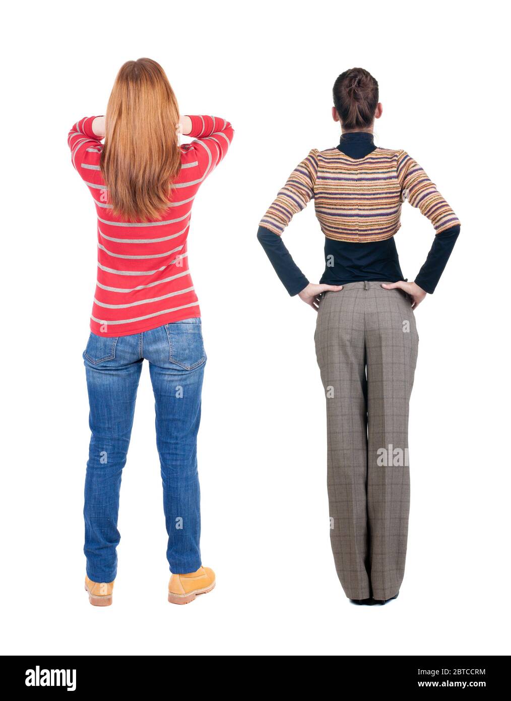 Back view of two woman in sweater. Rear view people collection ...