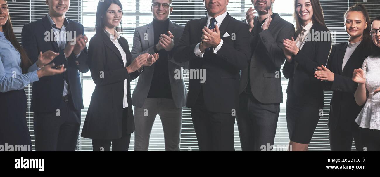 group of happy employees applauding their success Stock Photo - Alamy