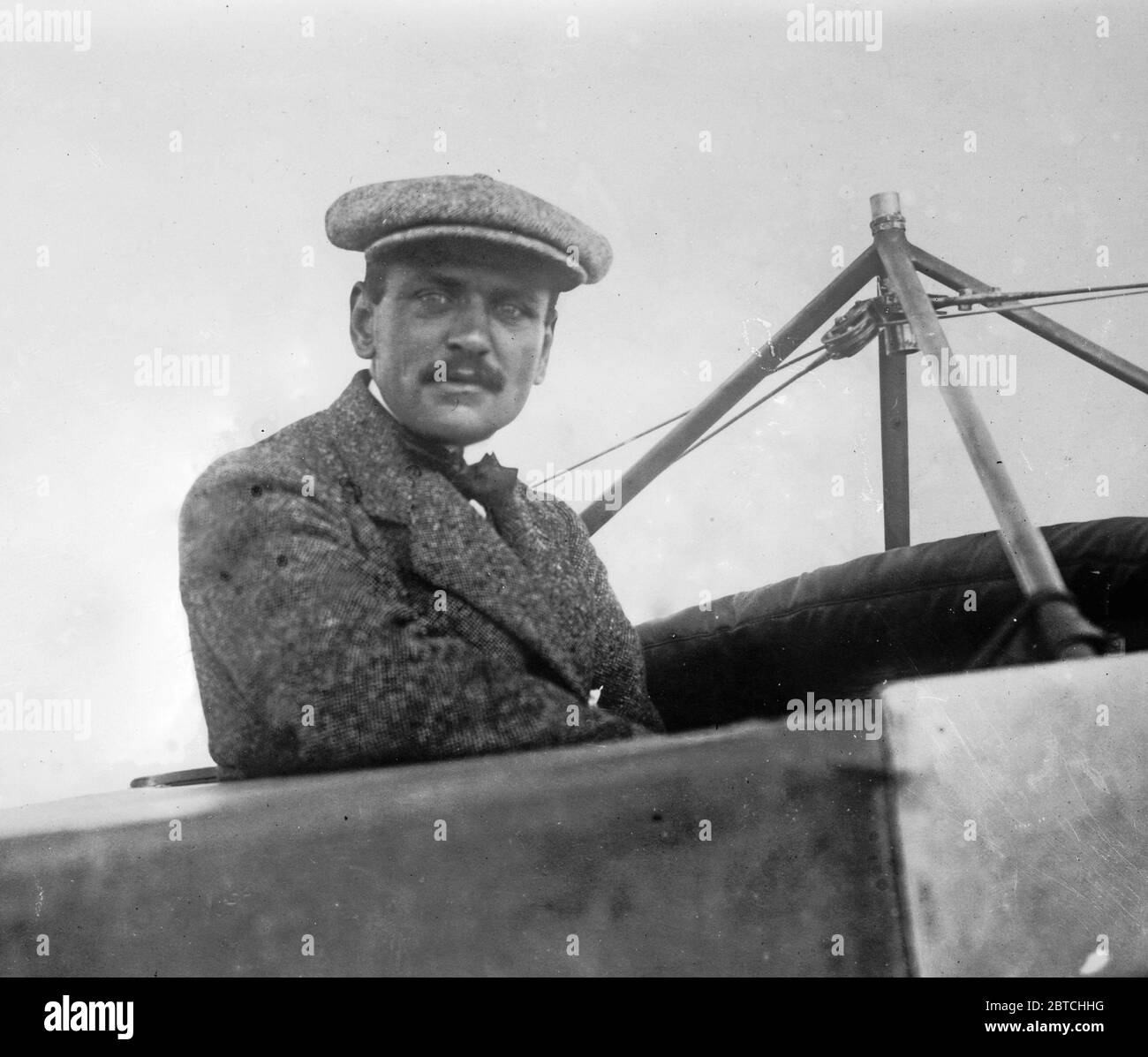 French aviator, Andre Frey (1886-1912) posed in the cockpit of an ...