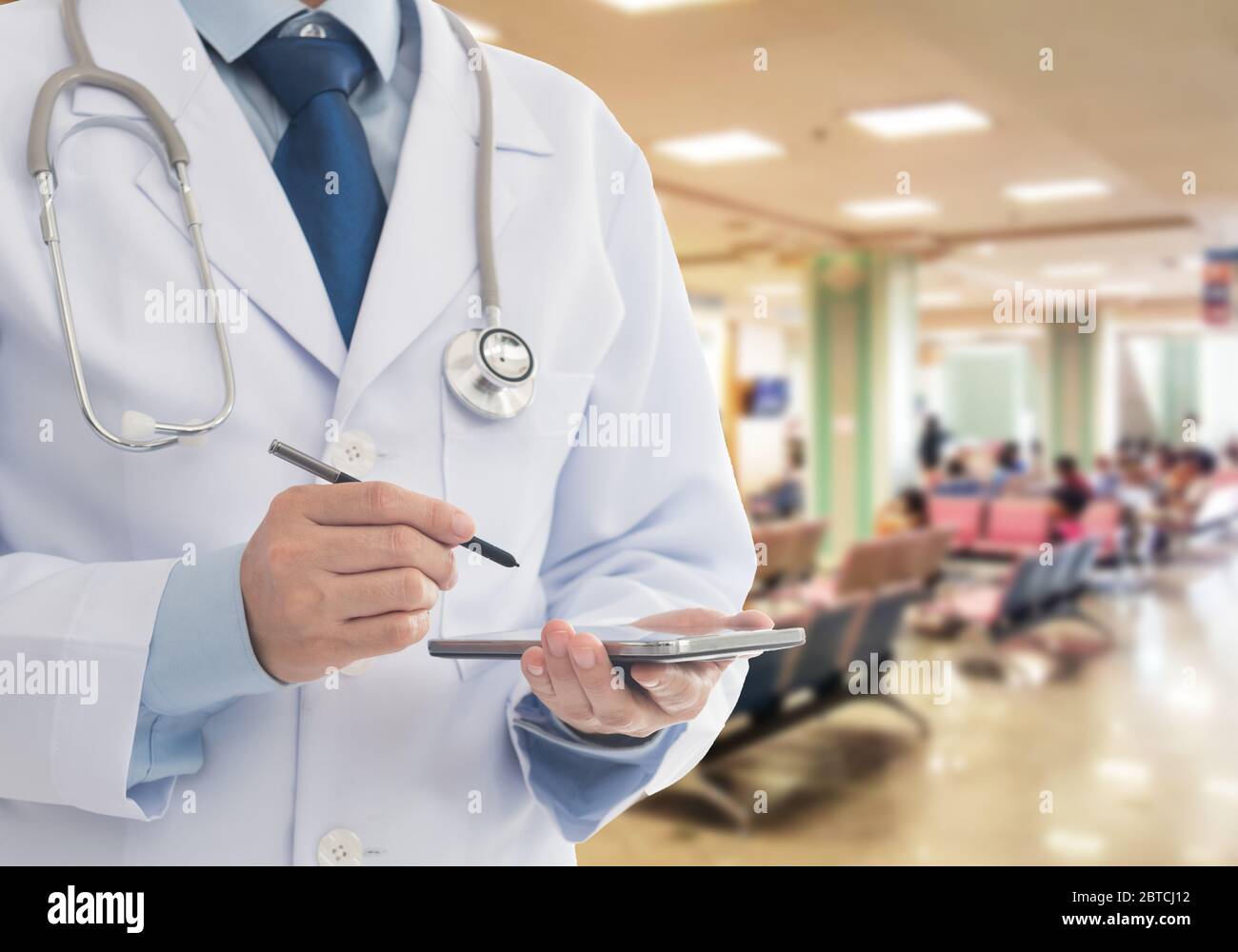 Doctor using a smart phone in hospital. Healthcare And Medicine Concept ...