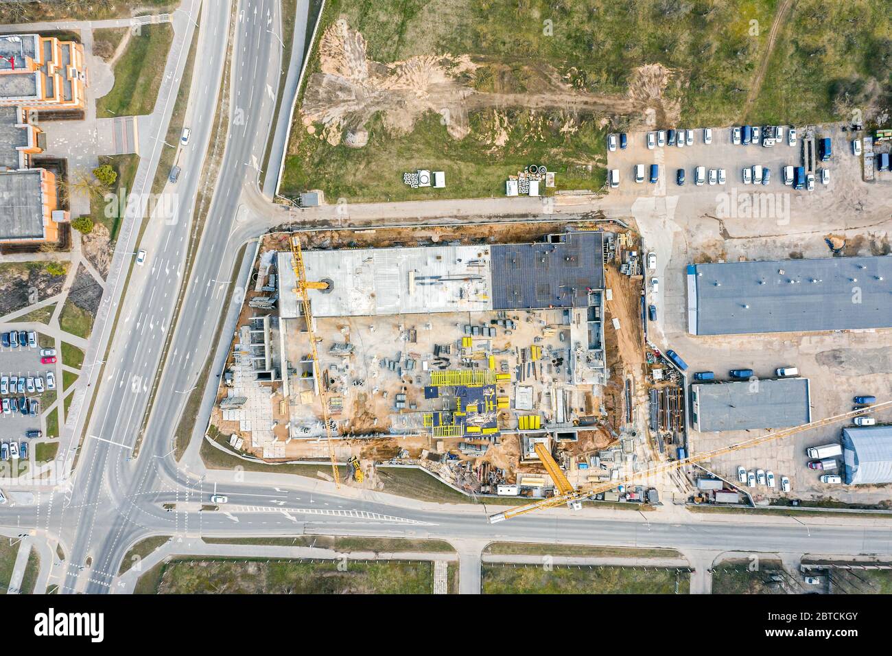 aerial top view of construction site in residential district with ...