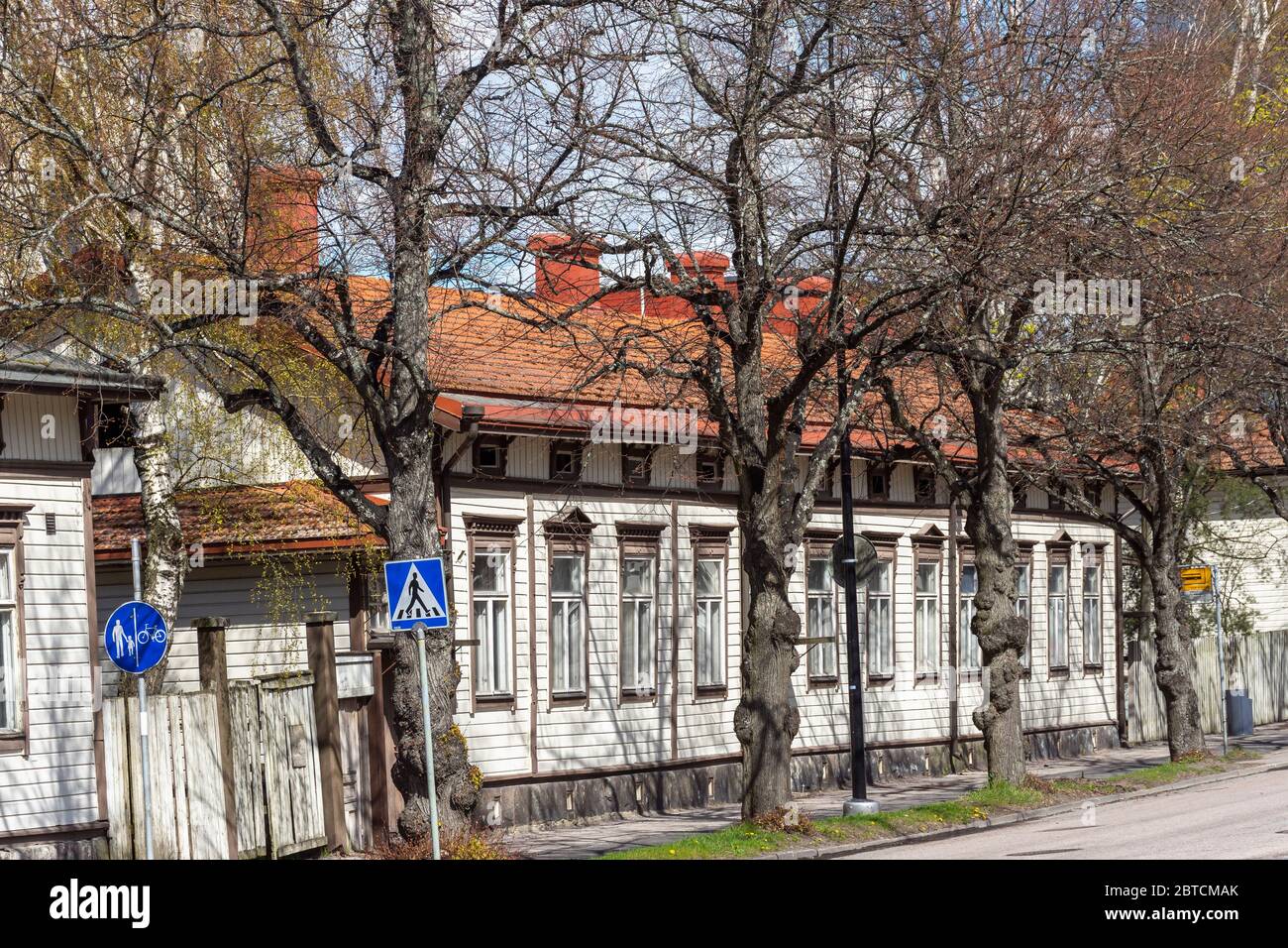 Traditional wooden department houses by the Linnankatu street in Turku ...