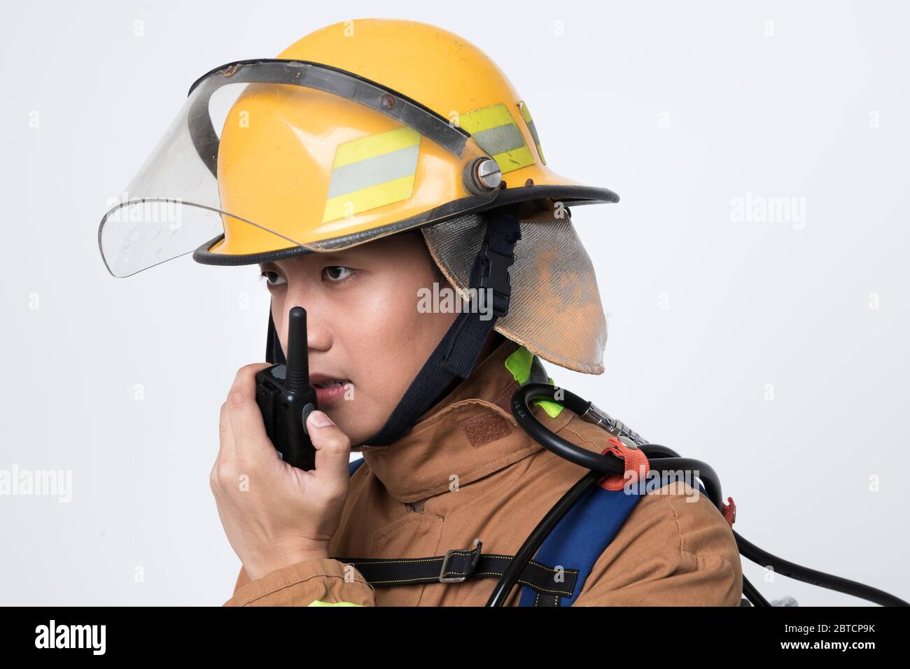 Asian male and female firefighter portrait, young smiling fireman in ...