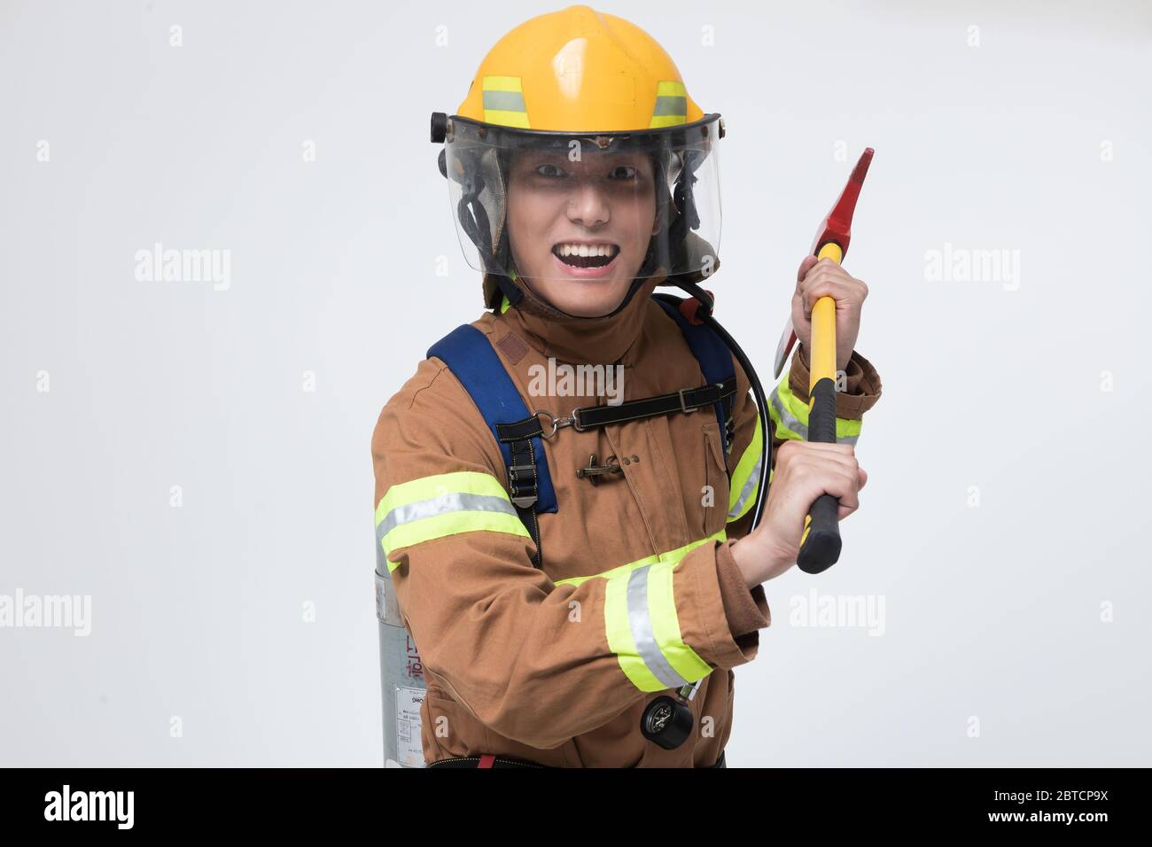 Asian male and female firefighter portrait, young smiling fireman in ...